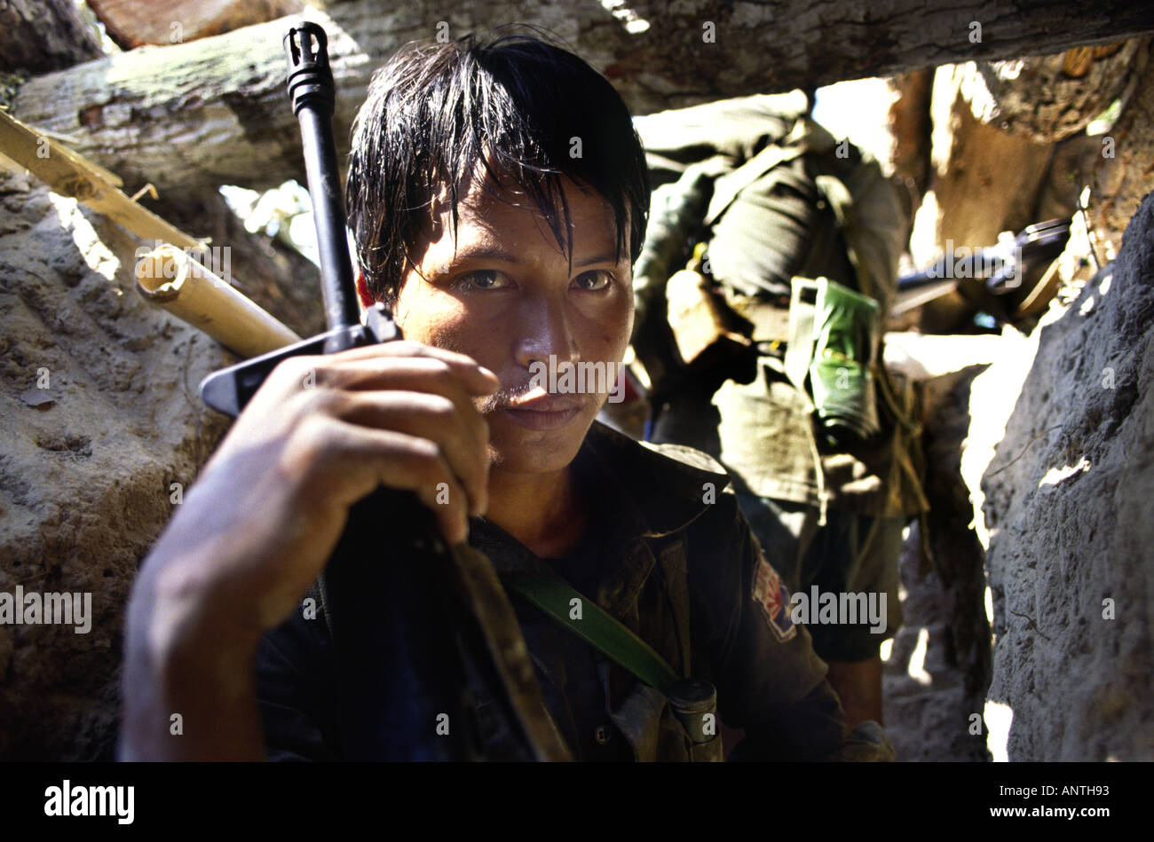KNLA fighter in trench at the frontline Kawtholei Burma Stock Photo - Alamy