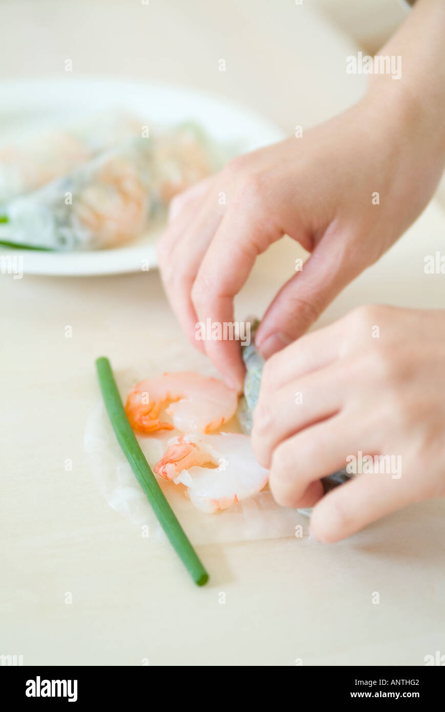 Preparing spring rolls Stock Photo - Alamy
