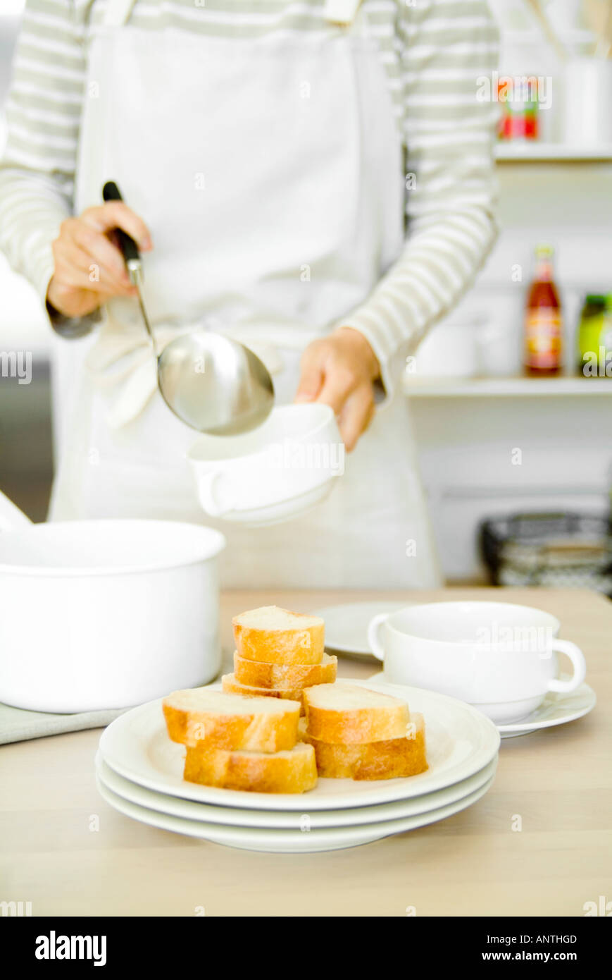 One woman only and soup hi-res stock photography and images - Alamy