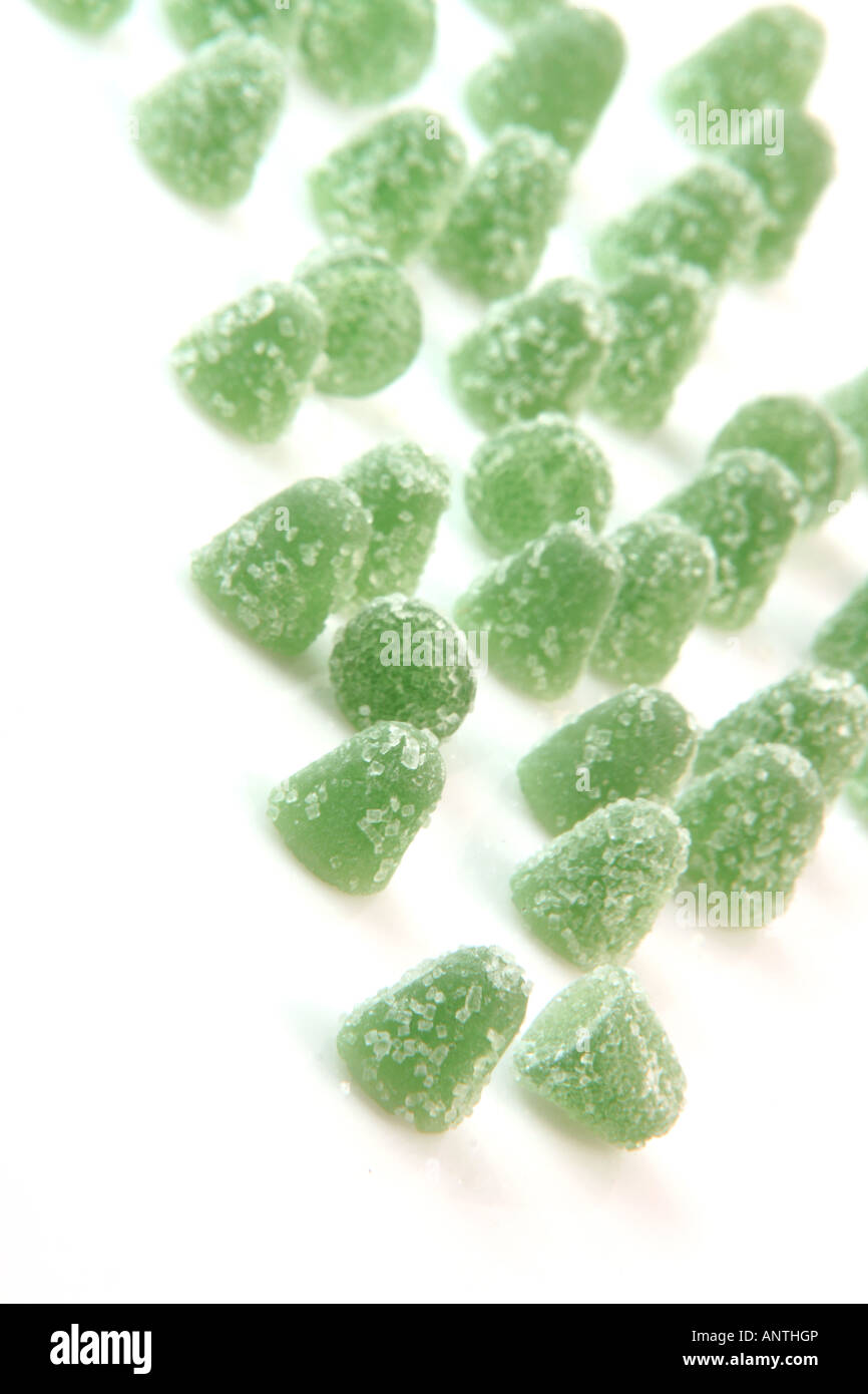 green sugar jelly mints isolated on white background sweets and candy ...