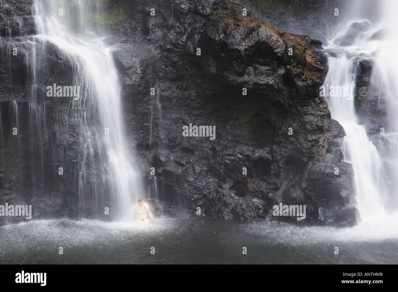 People swimming under waterfall hi-res stock photography and images - Alamy