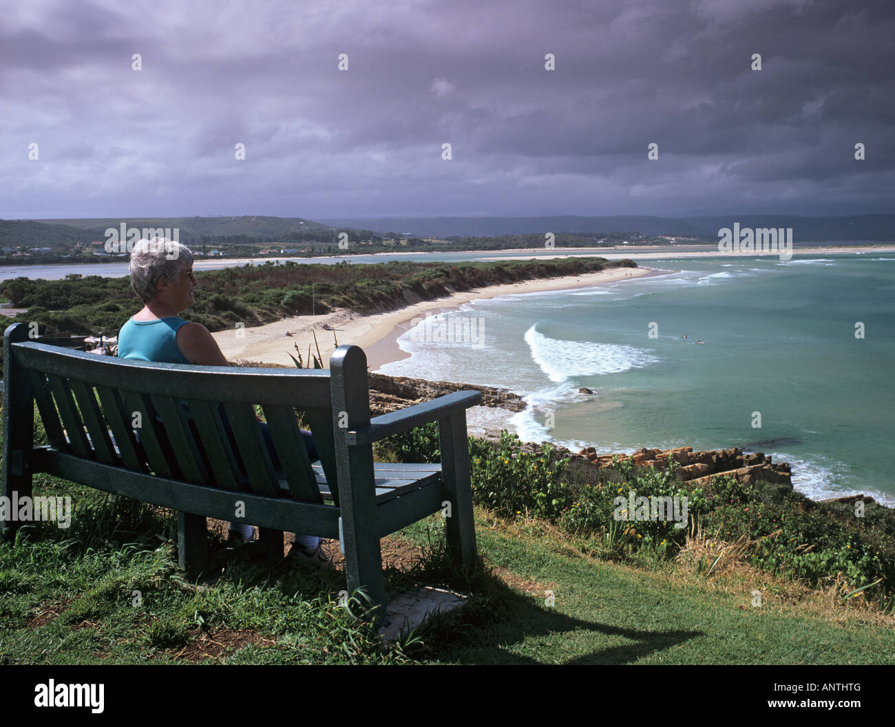 BENCH on LOOKOUT ROCKS a lady looking down on Lookout Beach Plettenberg ...