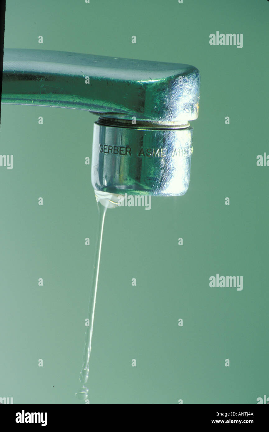 Faucet dripping water drops save and conserve our resources KIKE CALVO ...