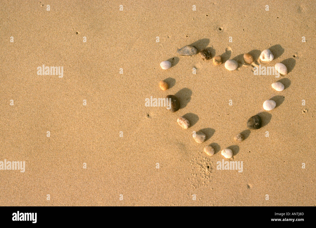 heart on sand Stock Photo - Alamy