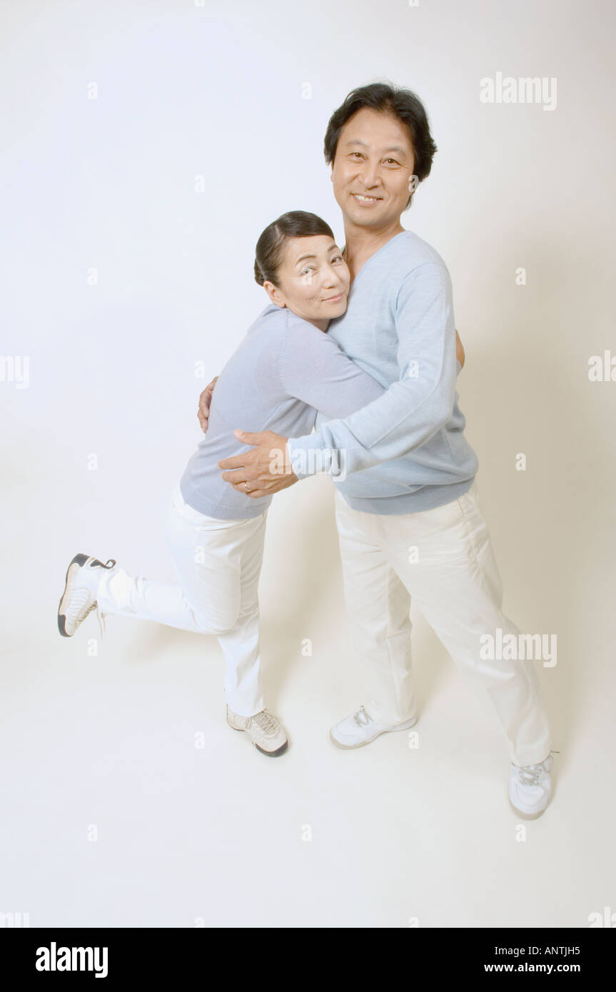 Mature couple holding each other Stock Photo - Alamy