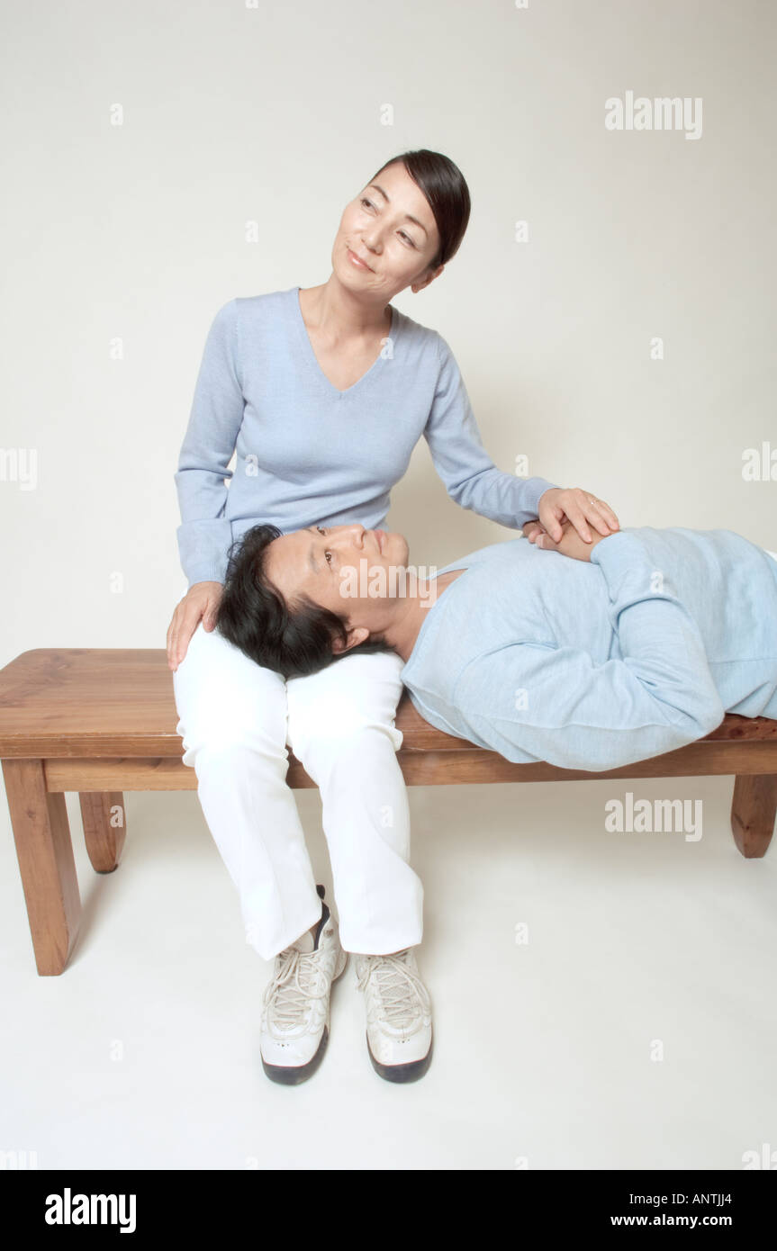 Woman sitting on man lap hi-res stock photography and images - Alamy