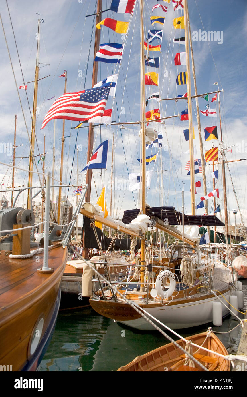 International flags flying on a wooden boat at the Classic Boat ...