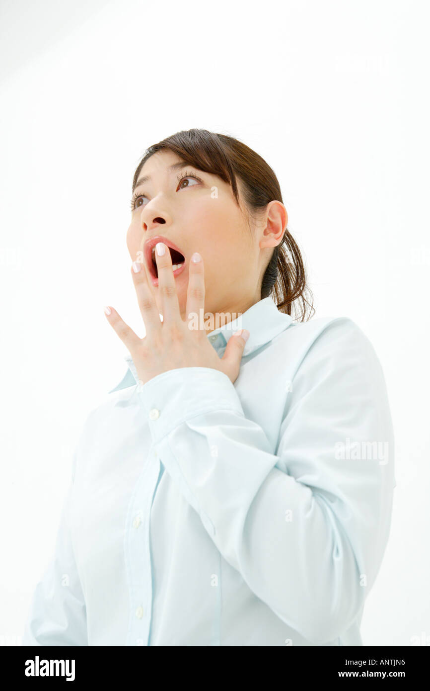 Young woman gasping Stock Photo - Alamy