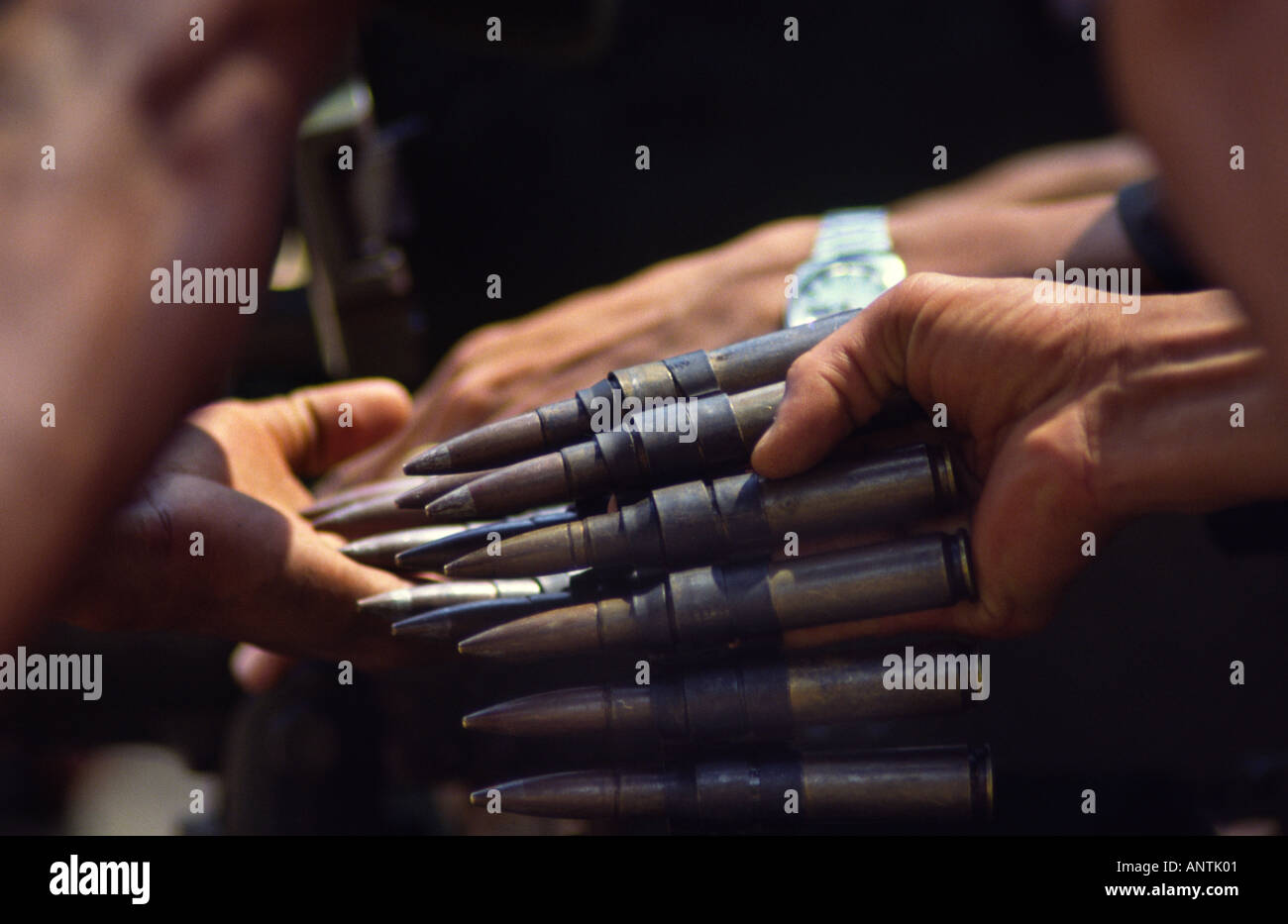KNLA Fighters loading machine gun Kawtholei Burma Stock Photo - Alamy