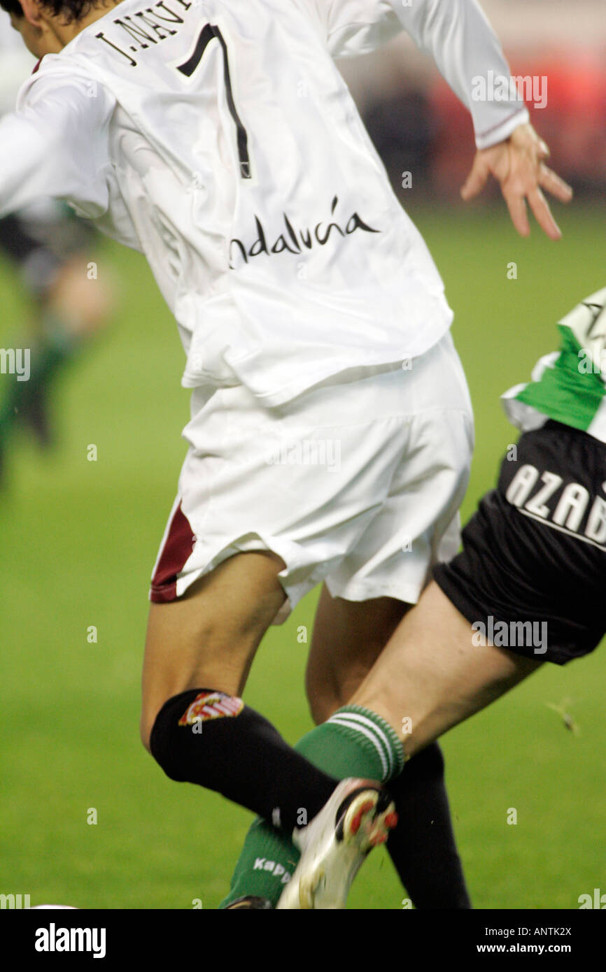 Navas being tripped by a Real Betis defender Stock Photo - Alamy