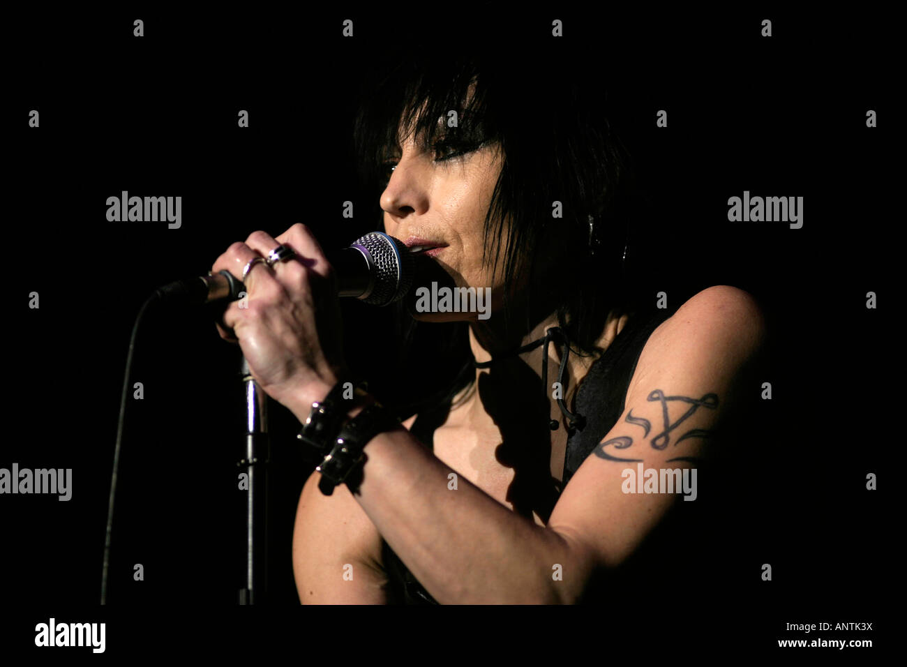 Joan Jett lead singer of Joan Jett And The Blackhearts playing the ...