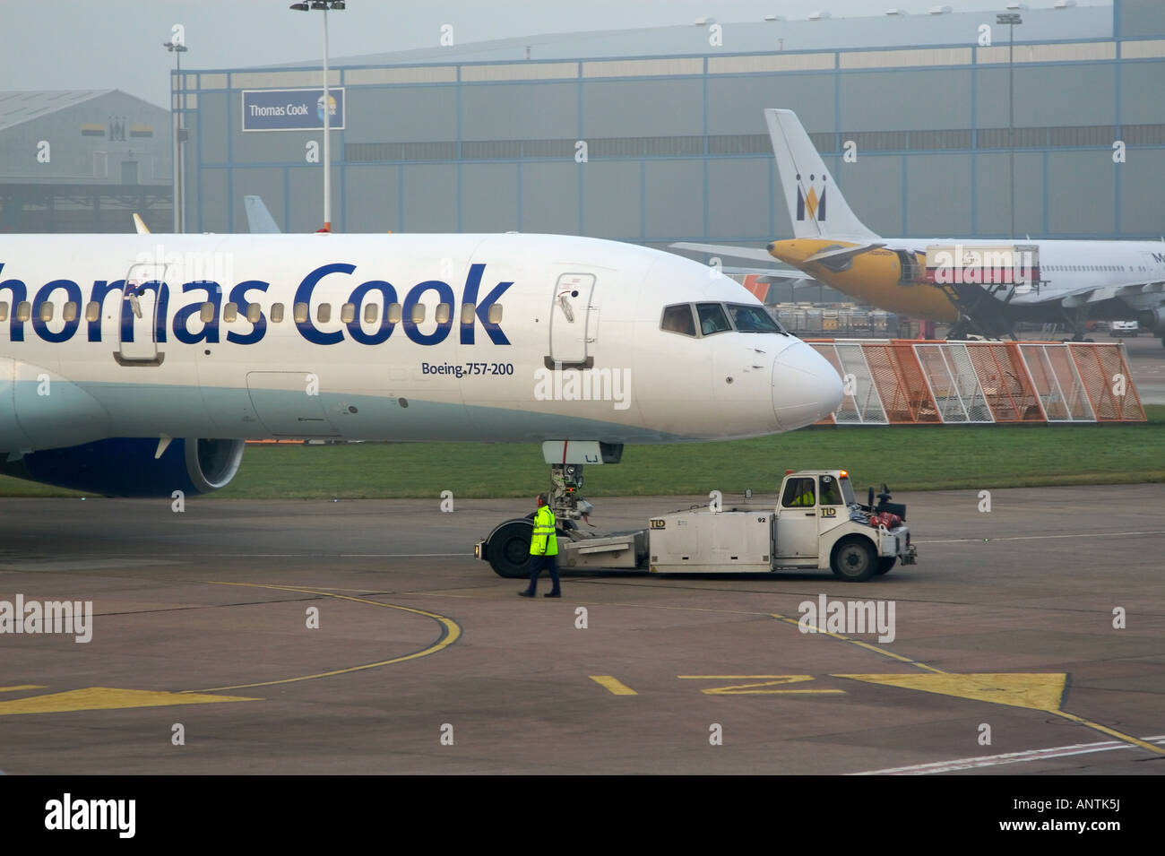 Thomas Cook plane being pulled ready to taxi Manchester International ...