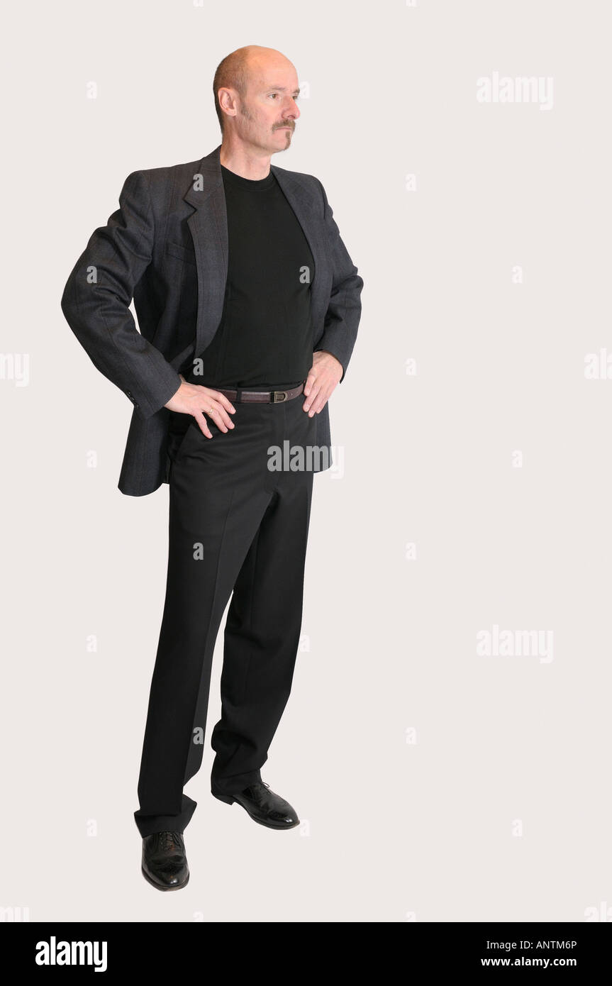 Cutout of man in jacket standing with arms akimbo Stock Photo - Alamy