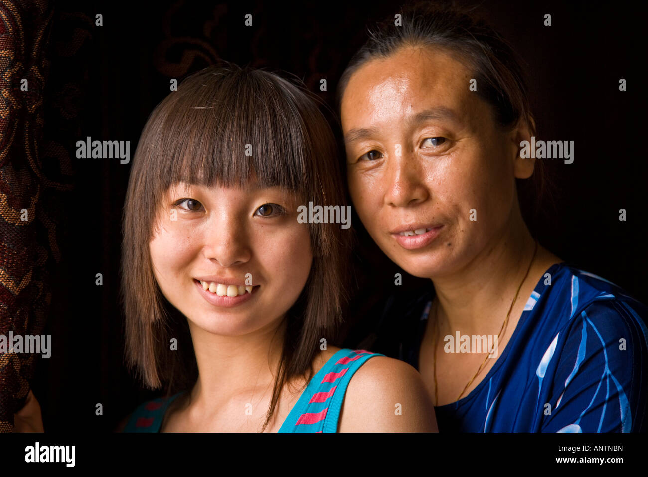 Close up beautiful attractive young asian oriental Chinese daughter and ...