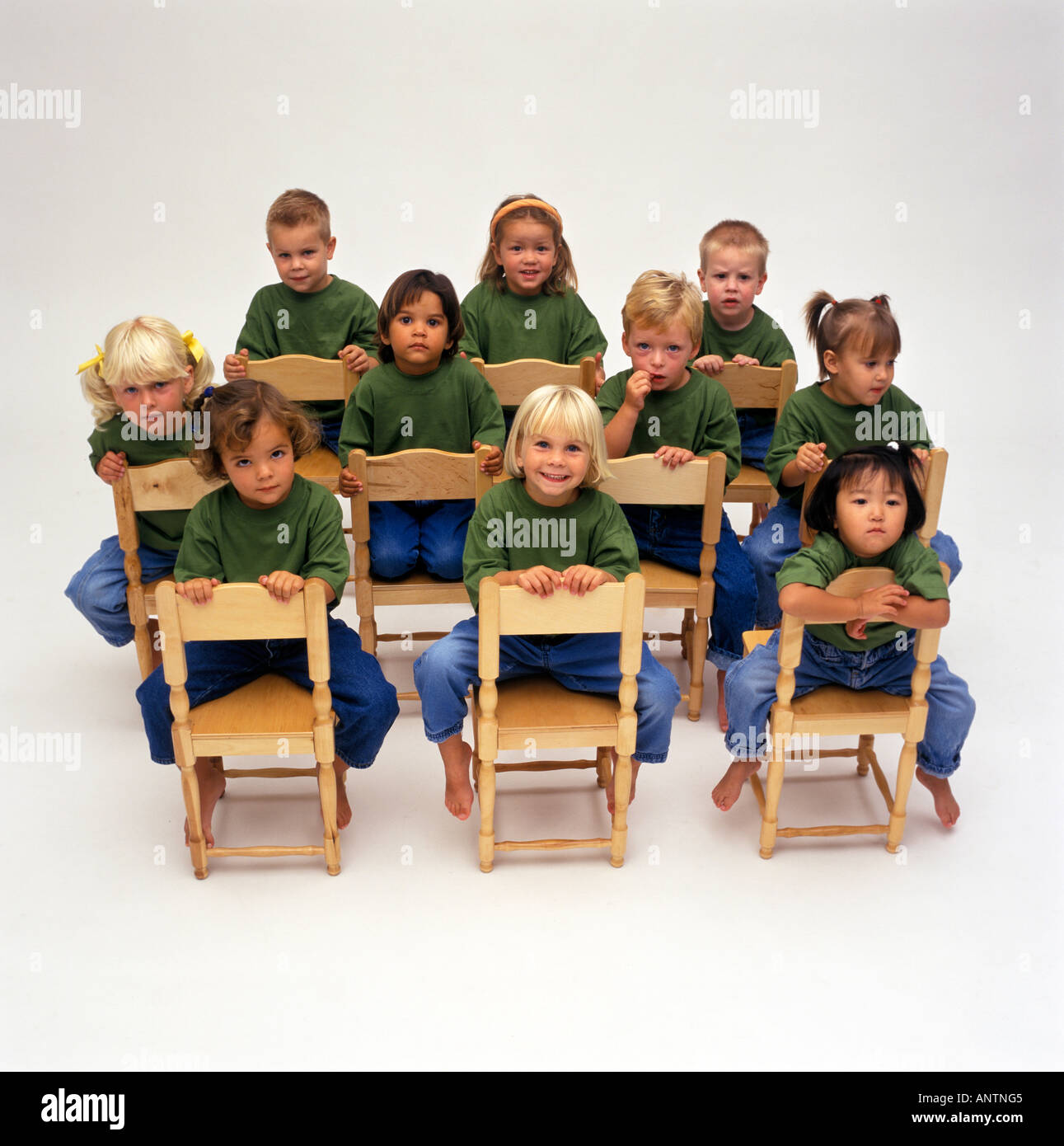 Boy sitting backwards in chair hi-res stock photography and images - Alamy