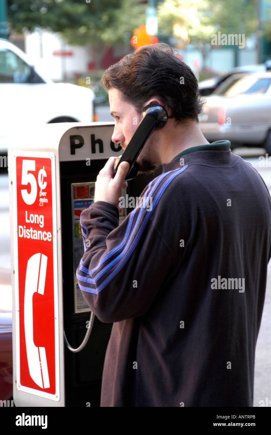 Man talking in a phone booth hi-res stock photography and images - Alamy