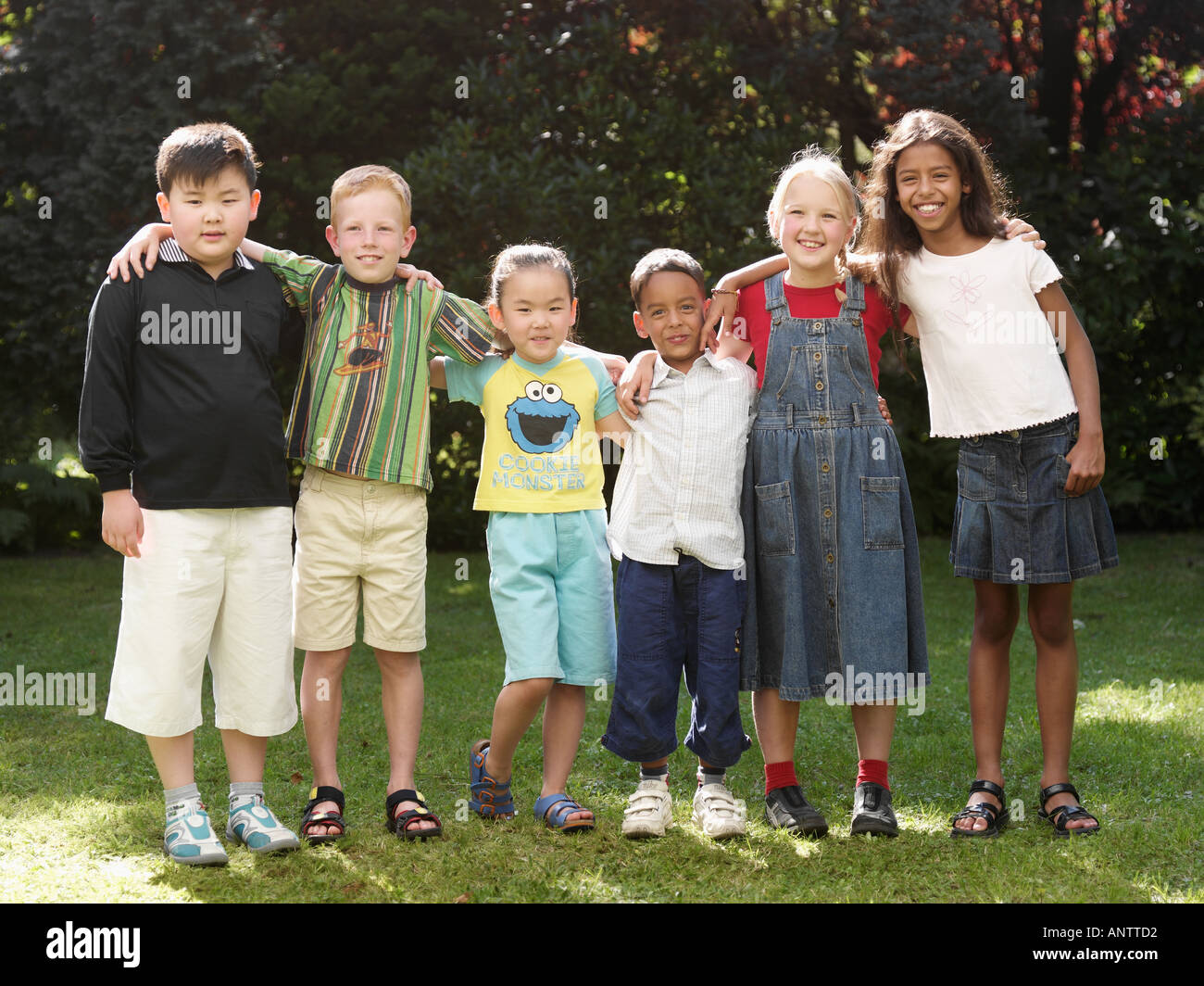 Children arms around each other hi-res stock photography and images - Alamy