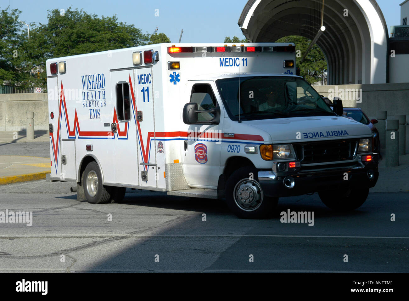 An Ambulance rushes from an accident to the hospital in downtown ...