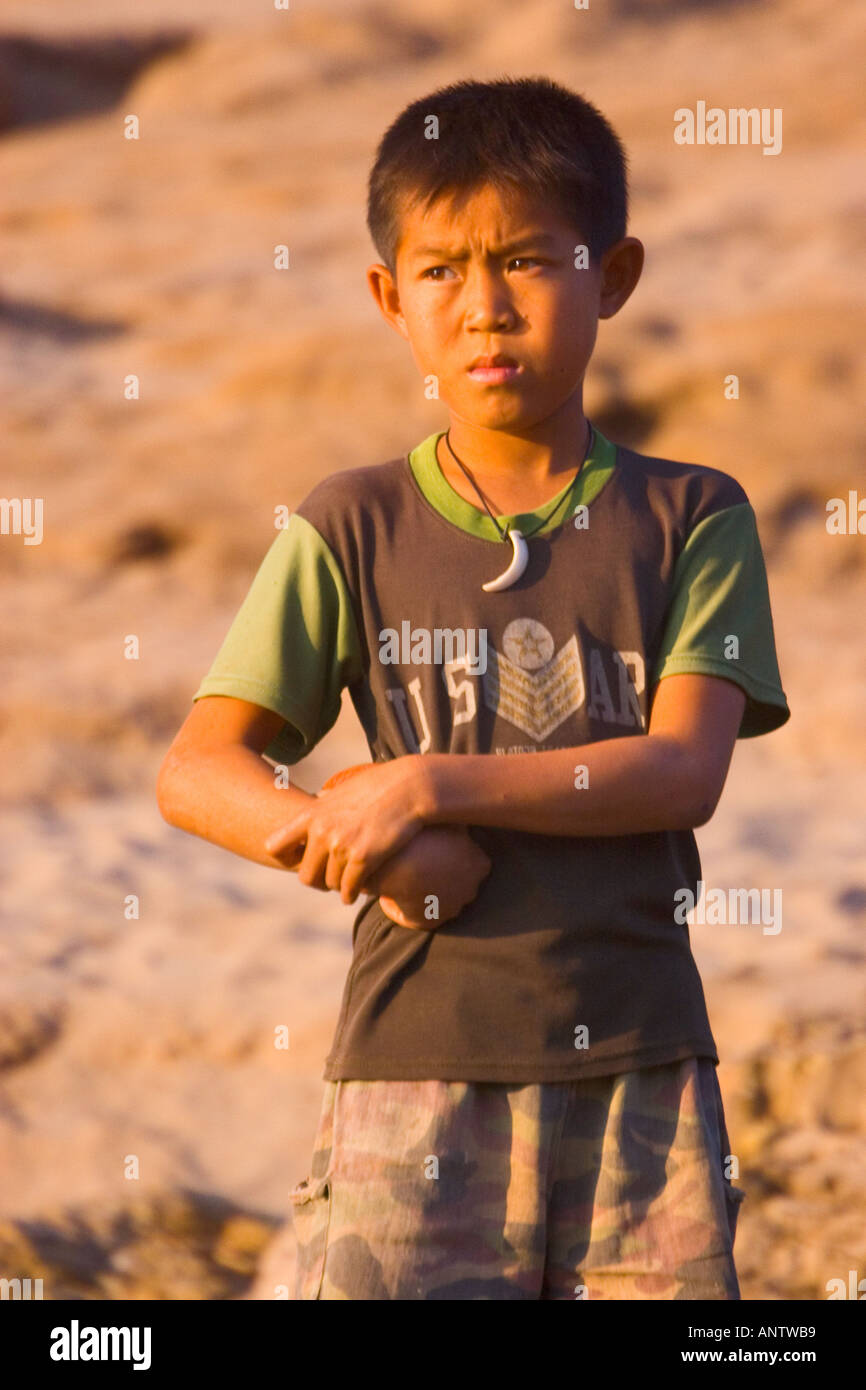 Young boy on the Mekong river Laos Stock Photo - Alamy