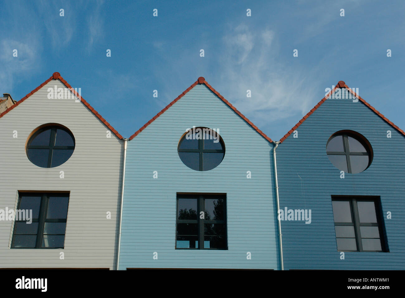 Three façades painted in blue Stock Photo - Alamy