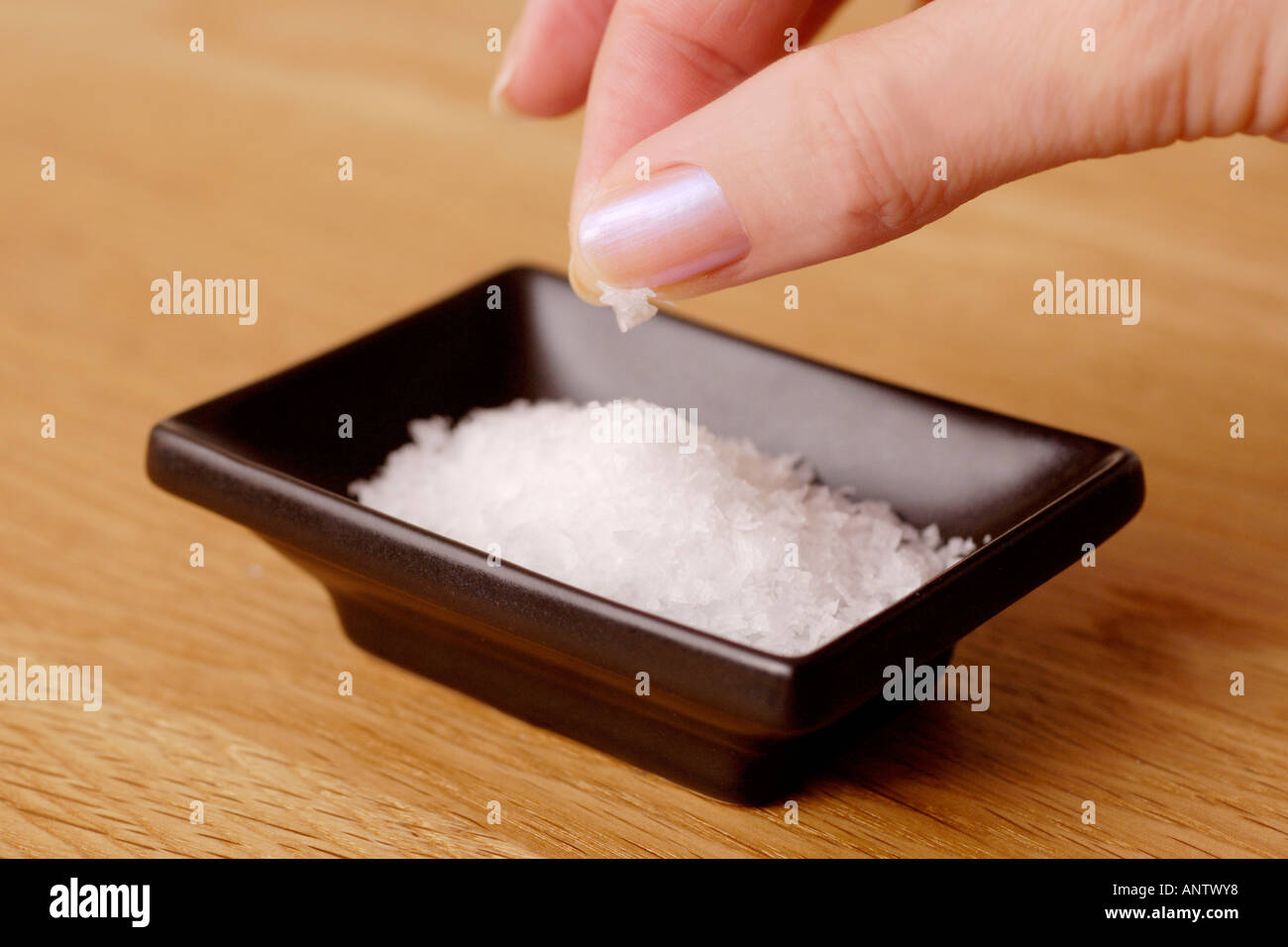 Woman pinch of salt hi-res stock photography and images - Alamy
