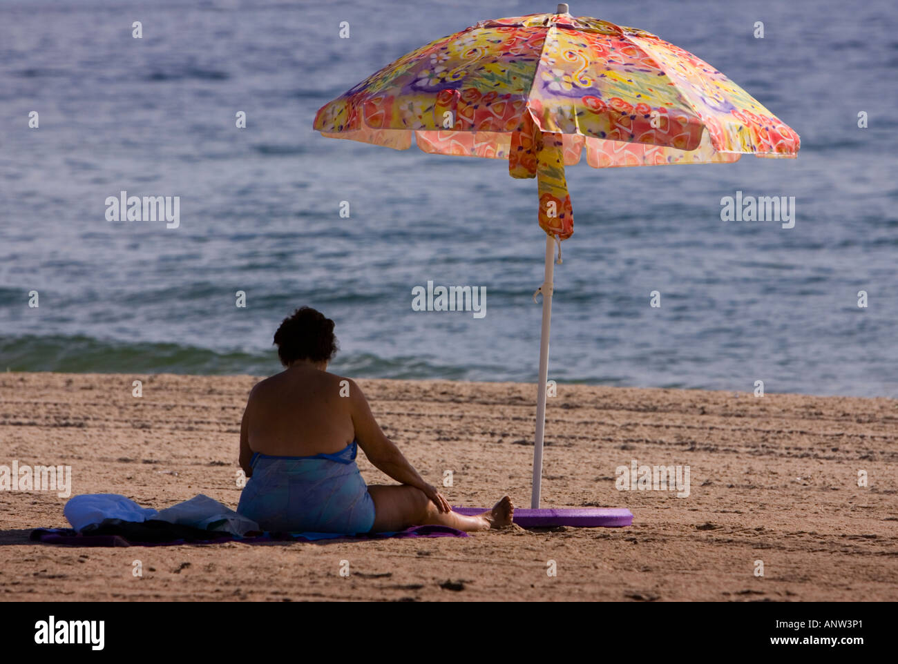 Overweight woman on a beach hi-res stock photography and images - Alamy