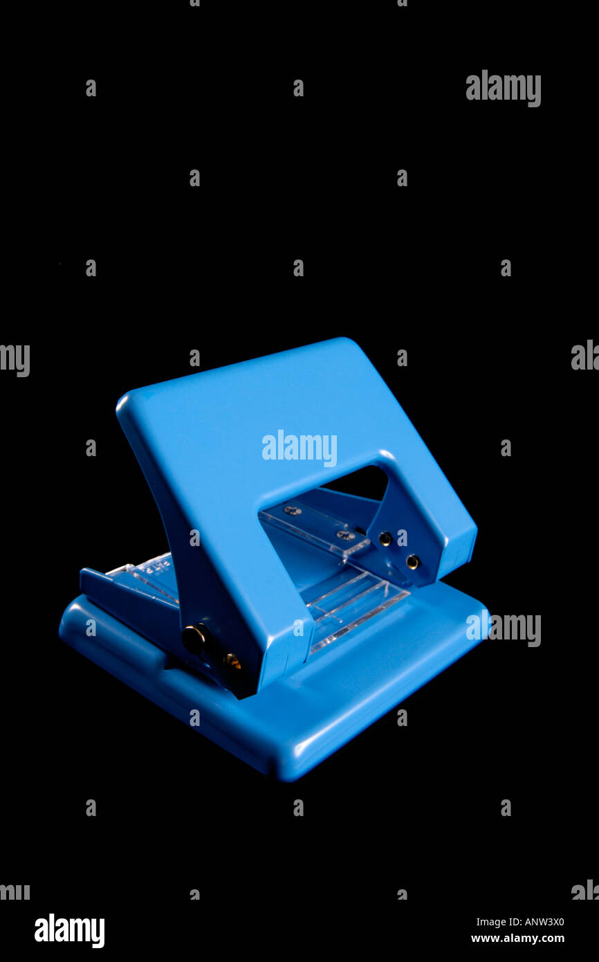 A blue office paper punch Stock Photo - Alamy