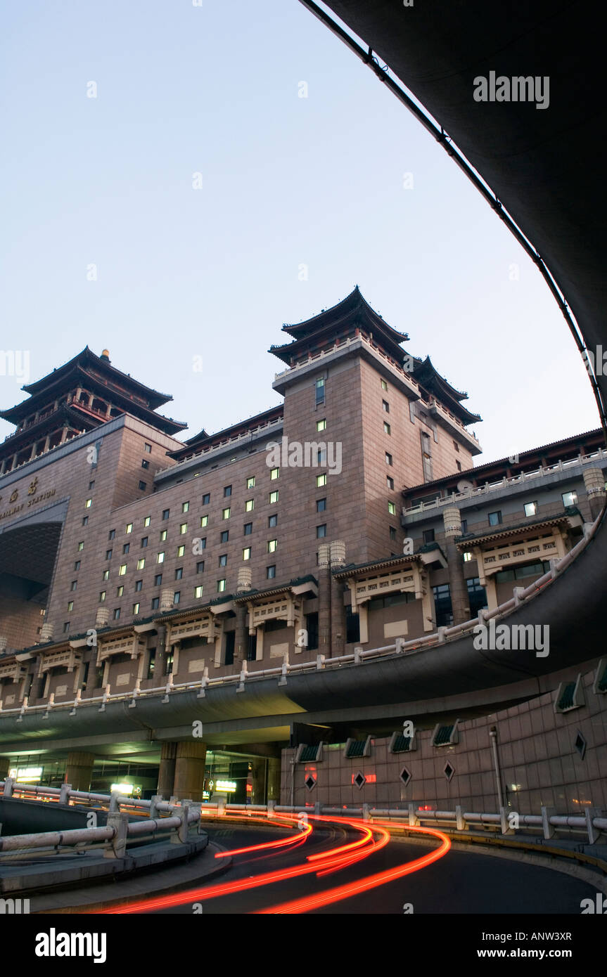car light trails highlight the old and new architecture at Beijing West ...
