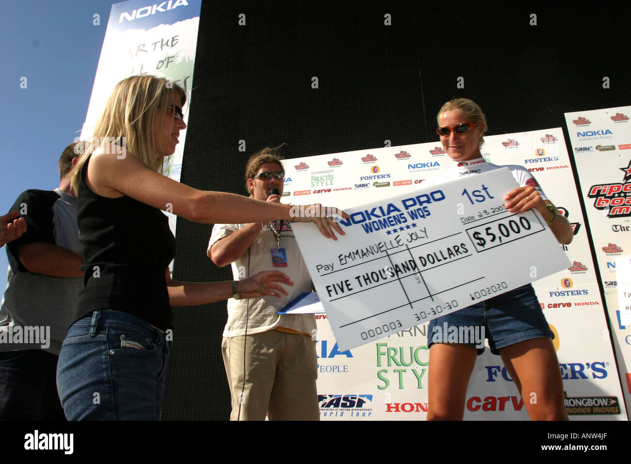 PRO SURFER EMMANUELLE JOLY RECEIVING WINNING CHEQUE Stock Photo - Alamy