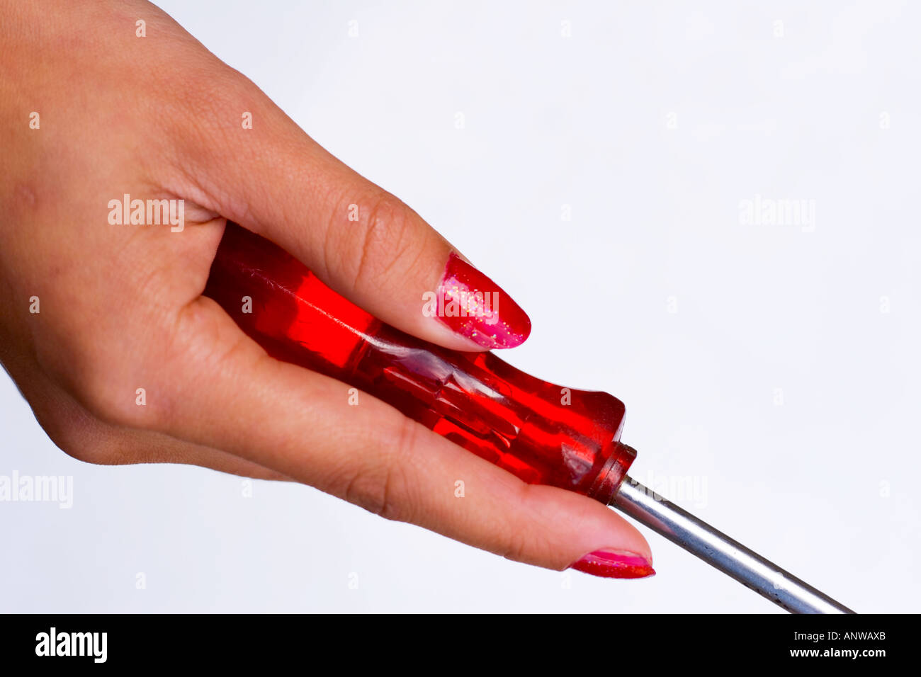 Hand screwdriver on white Cut Out Stock Images & Pictures - Alamy
