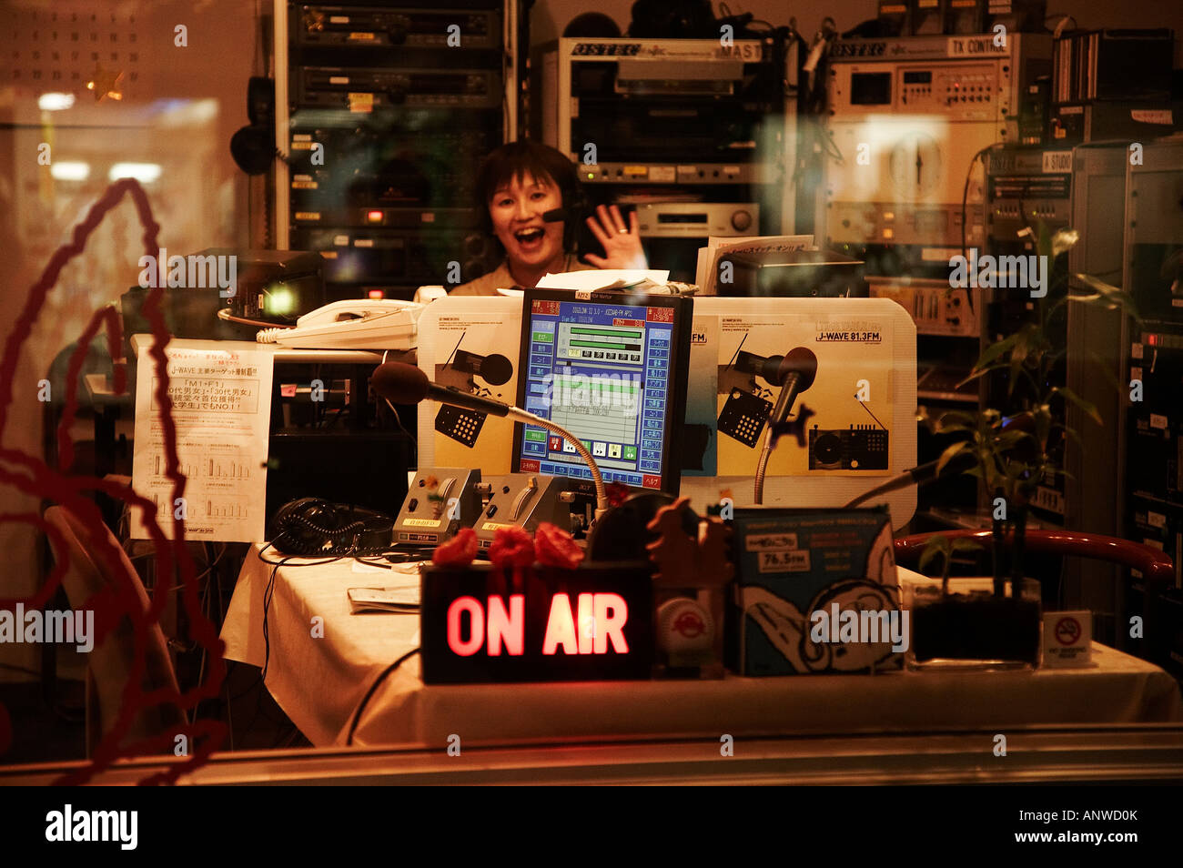 Japanese woman DJ waves from her studio, Oska Stock Photo - Alamy