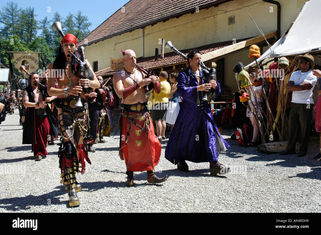 Move with bagpipes blowers in mediaeval medieval costume, knight ...