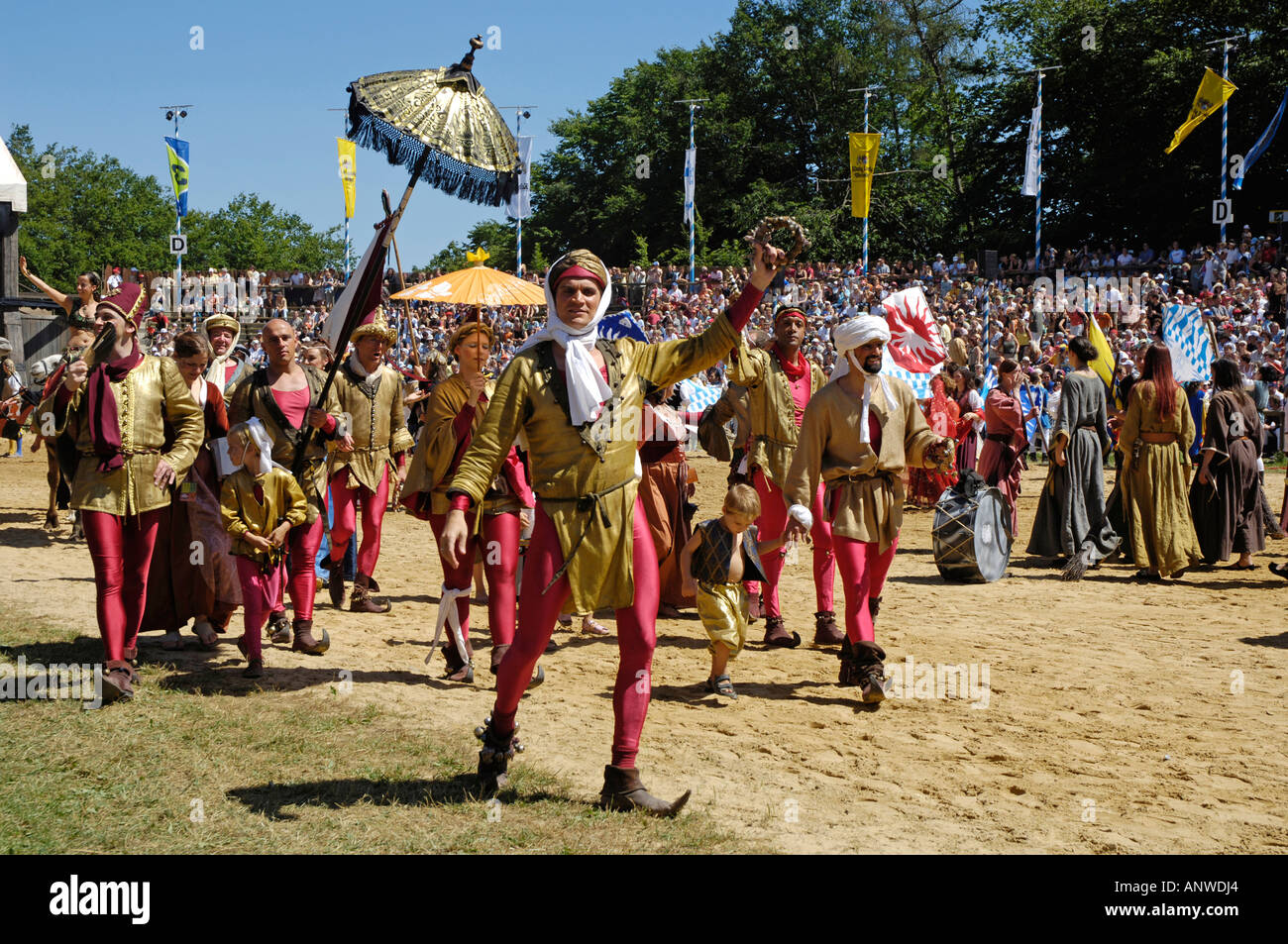 Move-in of comedians in mediaeval medieval costumes in arena, knight ...
