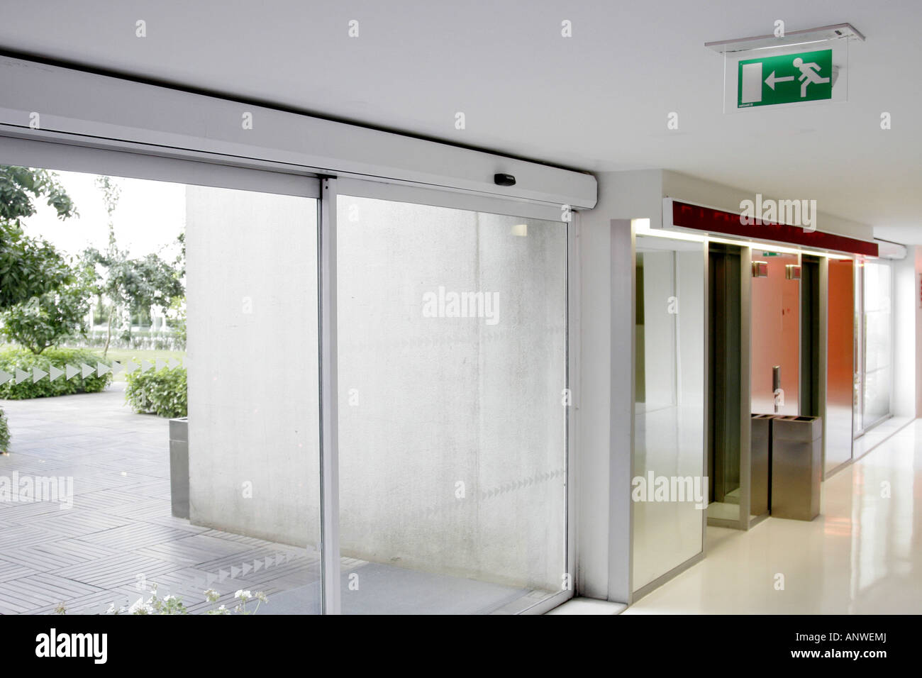 warning sign emergency way out in a hotel Stock Photo - Alamy