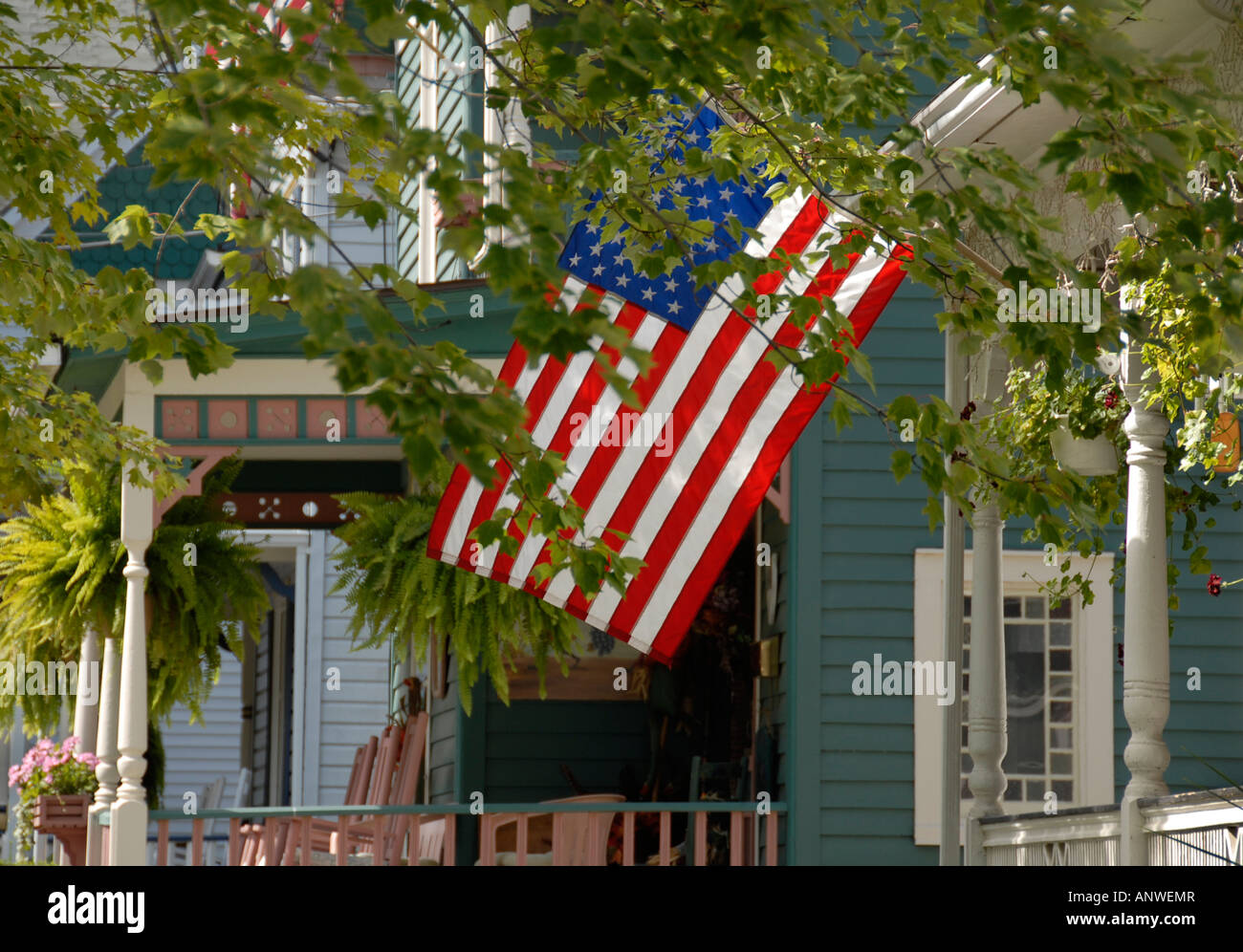 Patriotic display of American Flag on home Stock Photo - Alamy