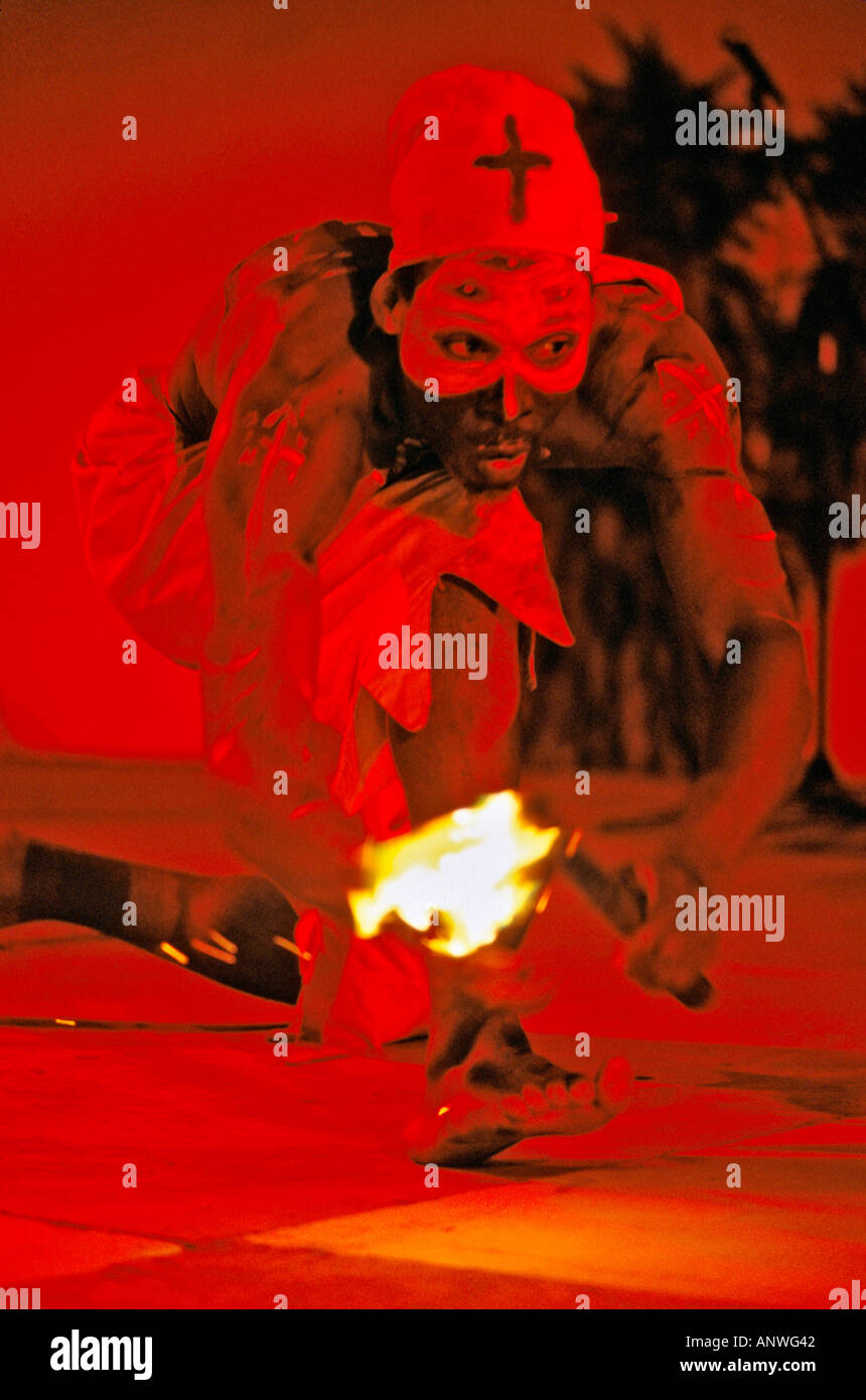 Man dancing with fire symbolizing the African deity Shangó at a ...
