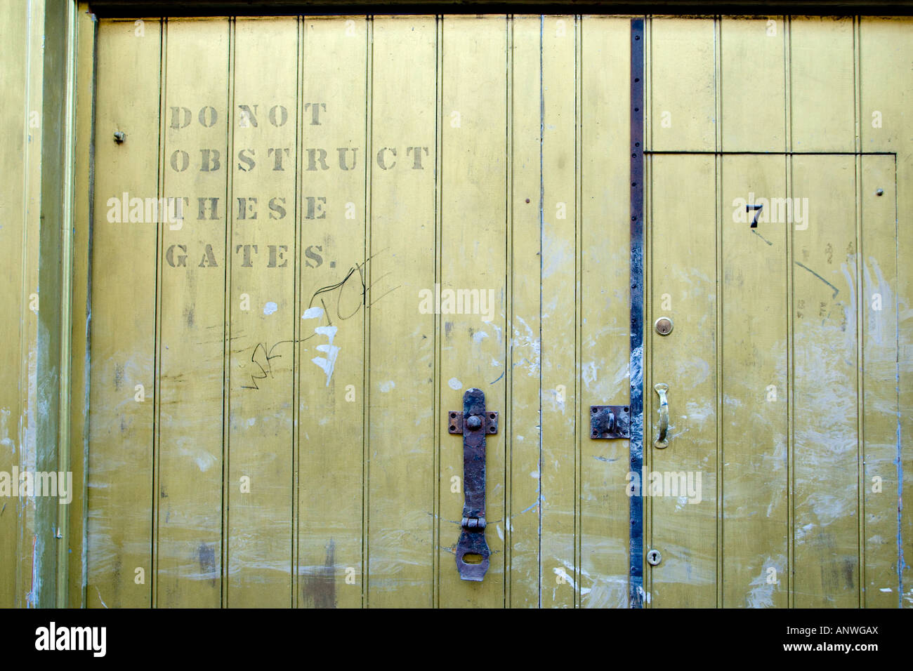 Stencilled notice on garage doors Do Not Obstruct These Gates Stock ...