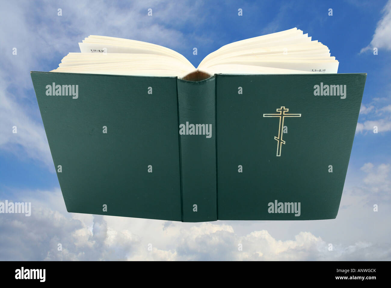 Opened holy bible over sky with clipping path isolated Stock Photo - Alamy