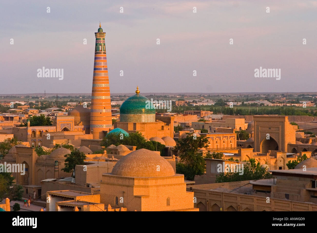 Panorama of the mud brick city of Khiva at sunset Khiva Uzbekistan ...