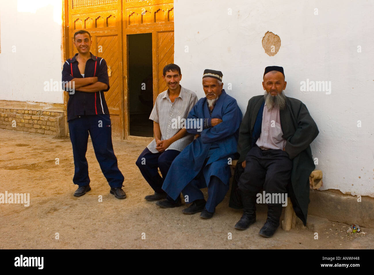 Uzbek men with traditional hat and dress Khiva Uzbekistan Stock Photo ...