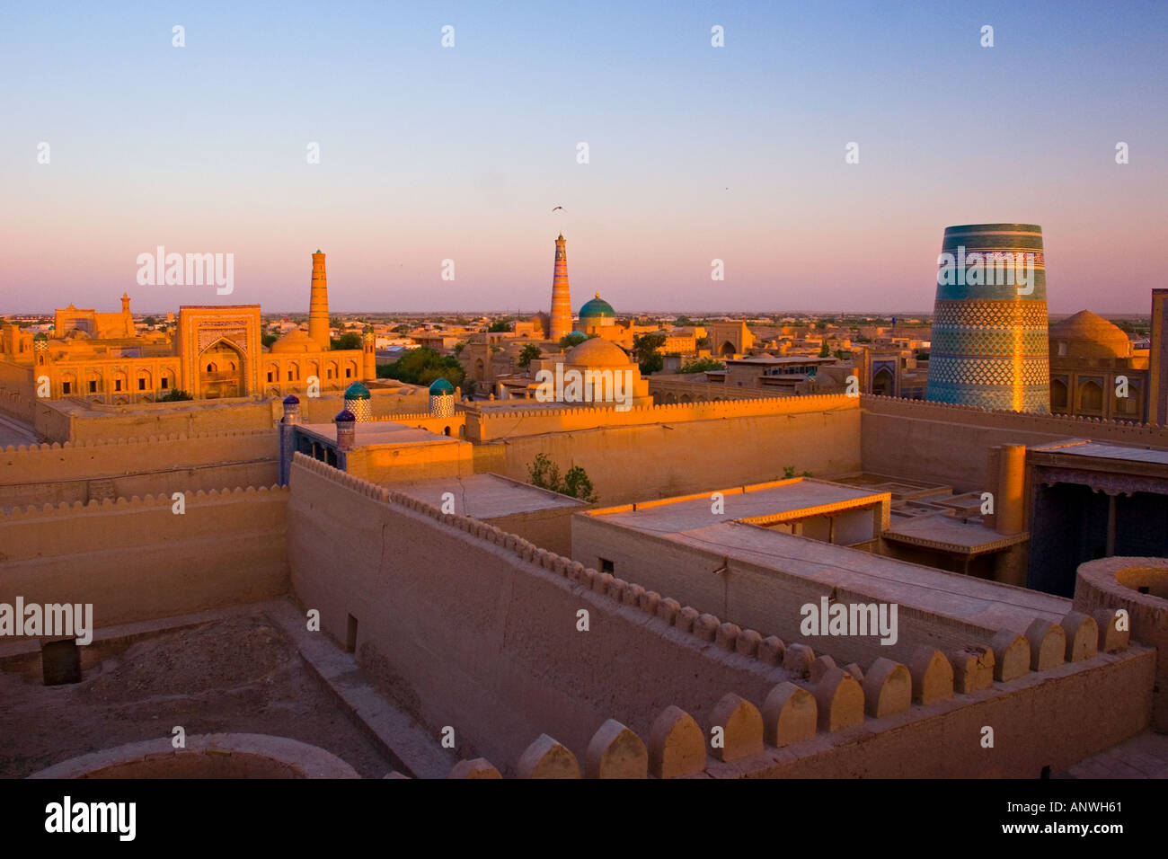 Panorama of the mud brick city of Khiva at sunset Khiva Uzbekistan ...