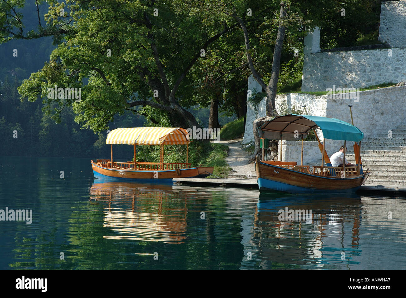 Boats on the attractive Lake Bled in Northern Slovenia Stock Photo - Alamy