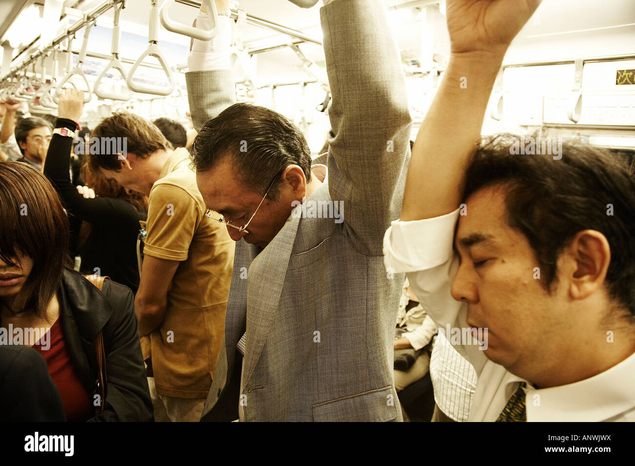 Sleeping commuters, Tokyo Stock Photo - Alamy