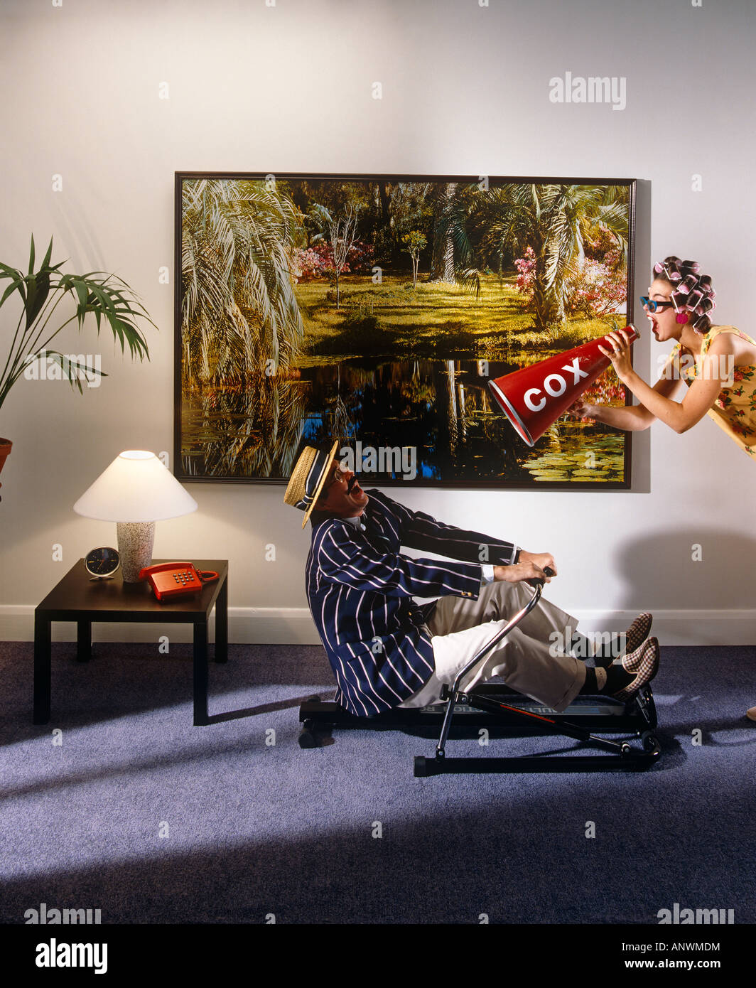 Man rowing machine home hi-res stock photography and images - Alamy