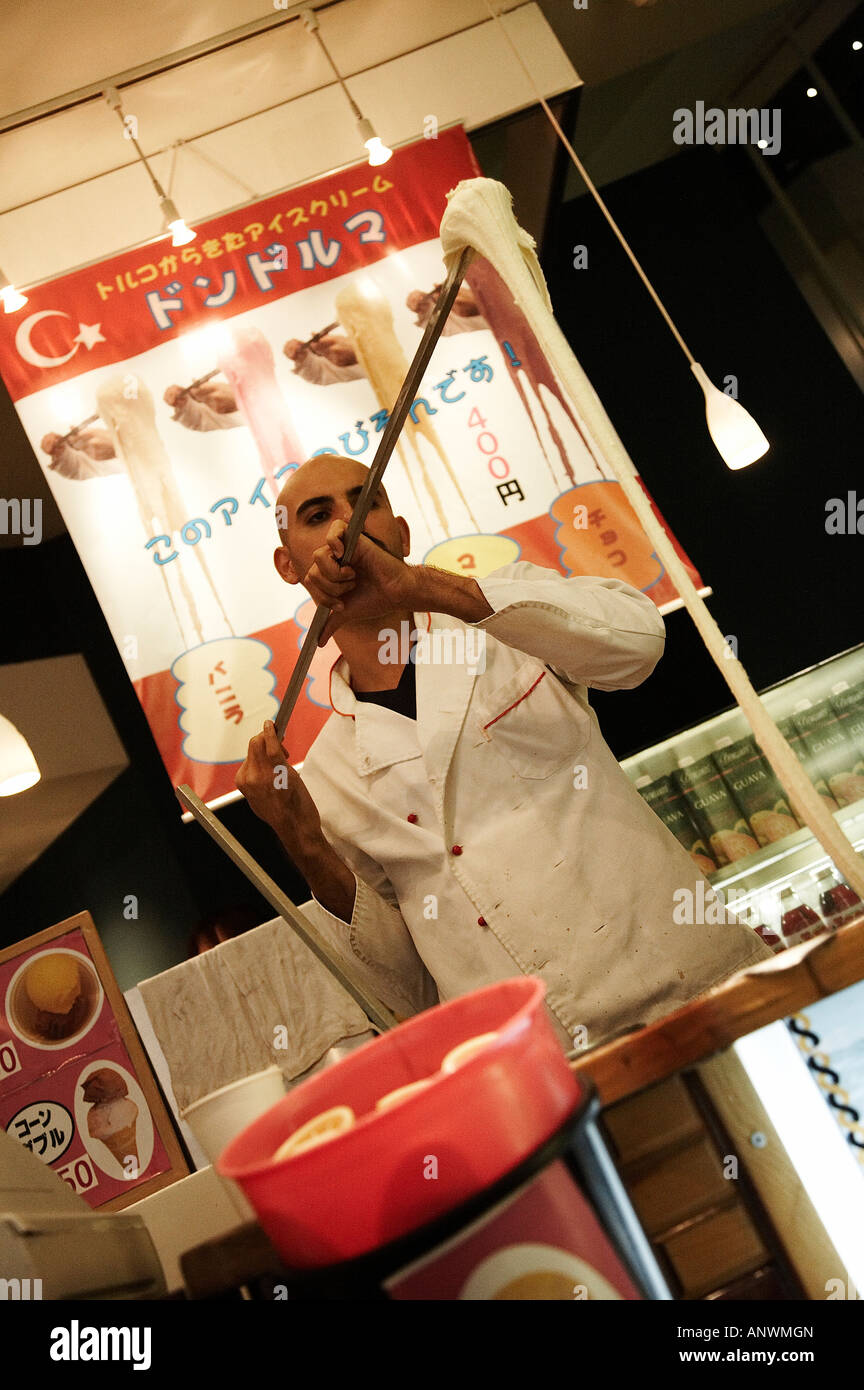 A man makes ice cream Stock Photo - Alamy