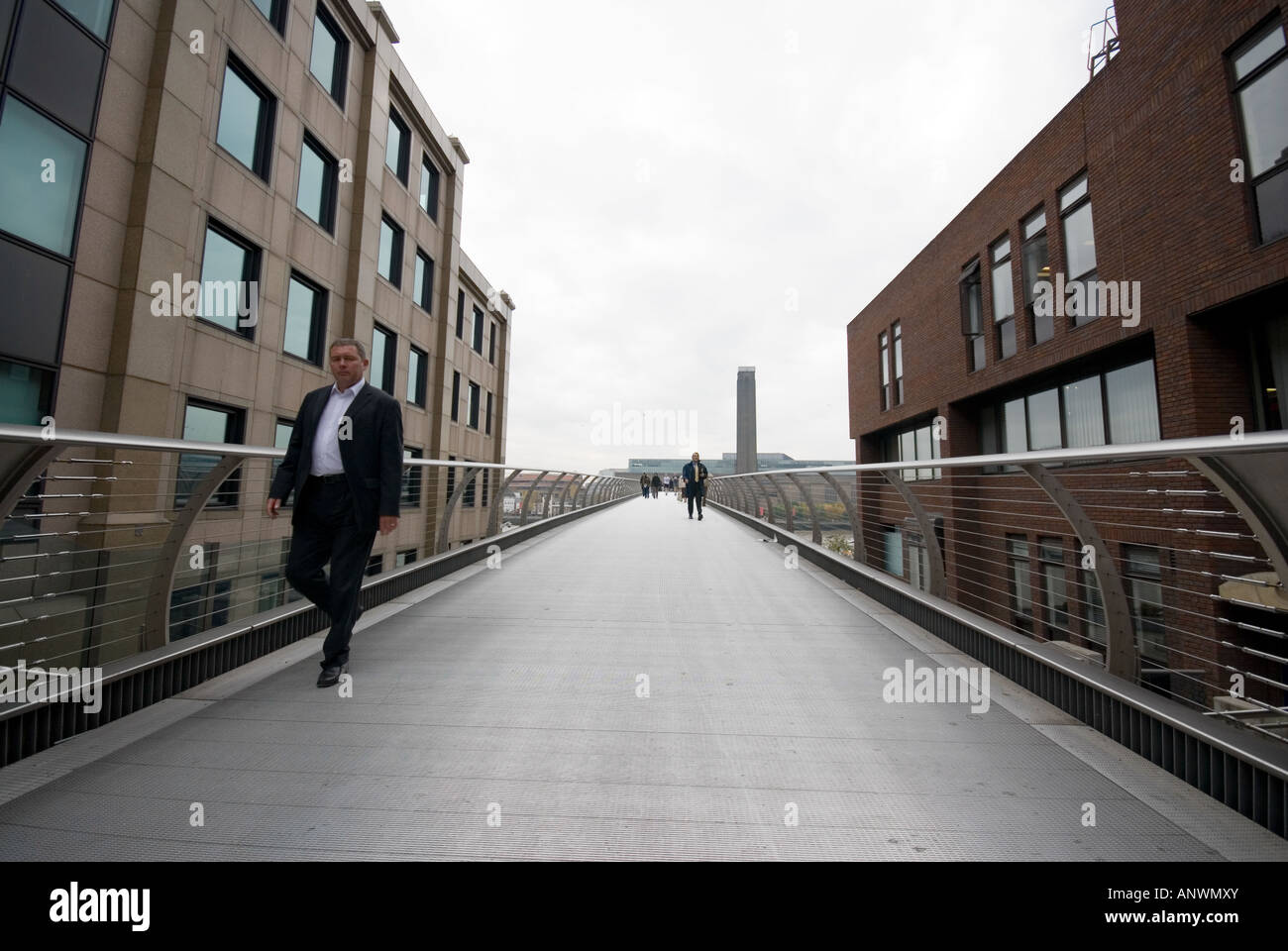 business man millenium bridge london Stock Photo - Alamy
