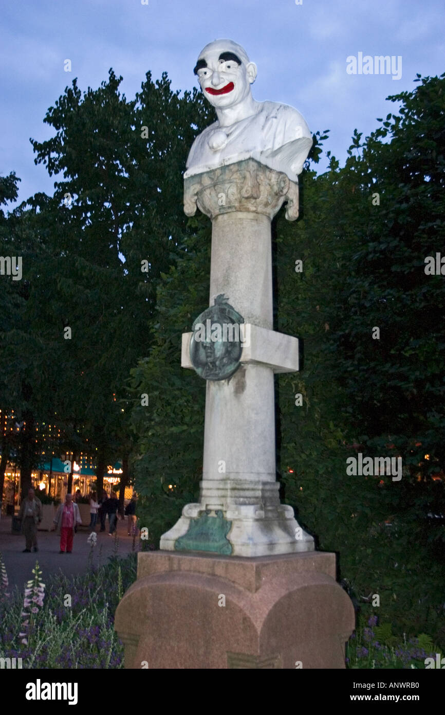 Sculpture of white clown at dusk Tivoli Gardens Copenhagen Denmark ...