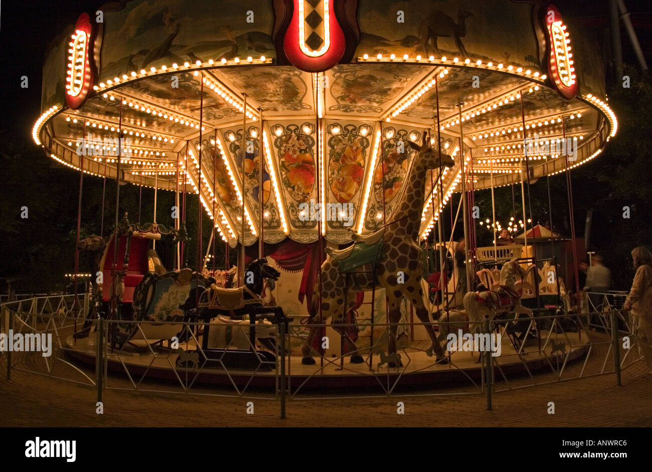 Carousel at night Tivoli Gardens Copenhagen Denmark Stock Photo - Alamy