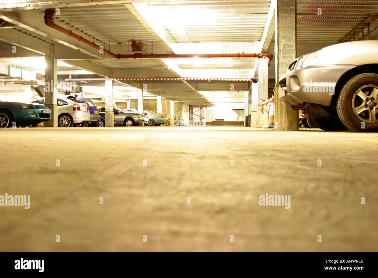 Underground car park in basement of apartment building Stock Photo - Alamy