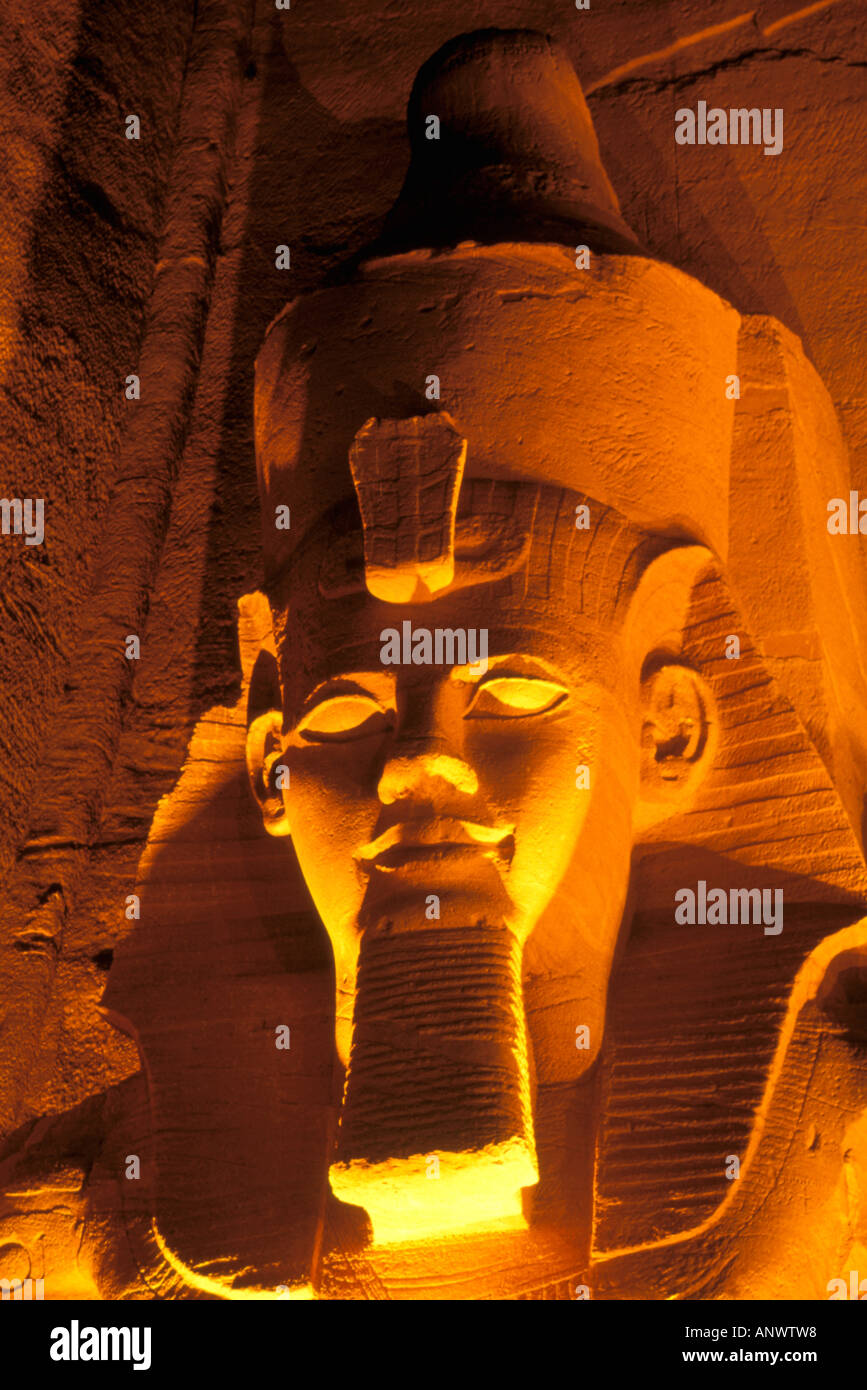 Africa, Egypt, Abu Simbel. Great Temple of Ramesses, lighted face of ...